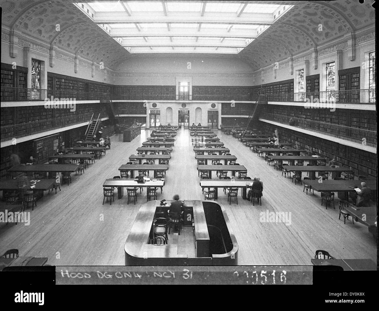 A black-and-white photograph of the Reading Room at the Public Library ...