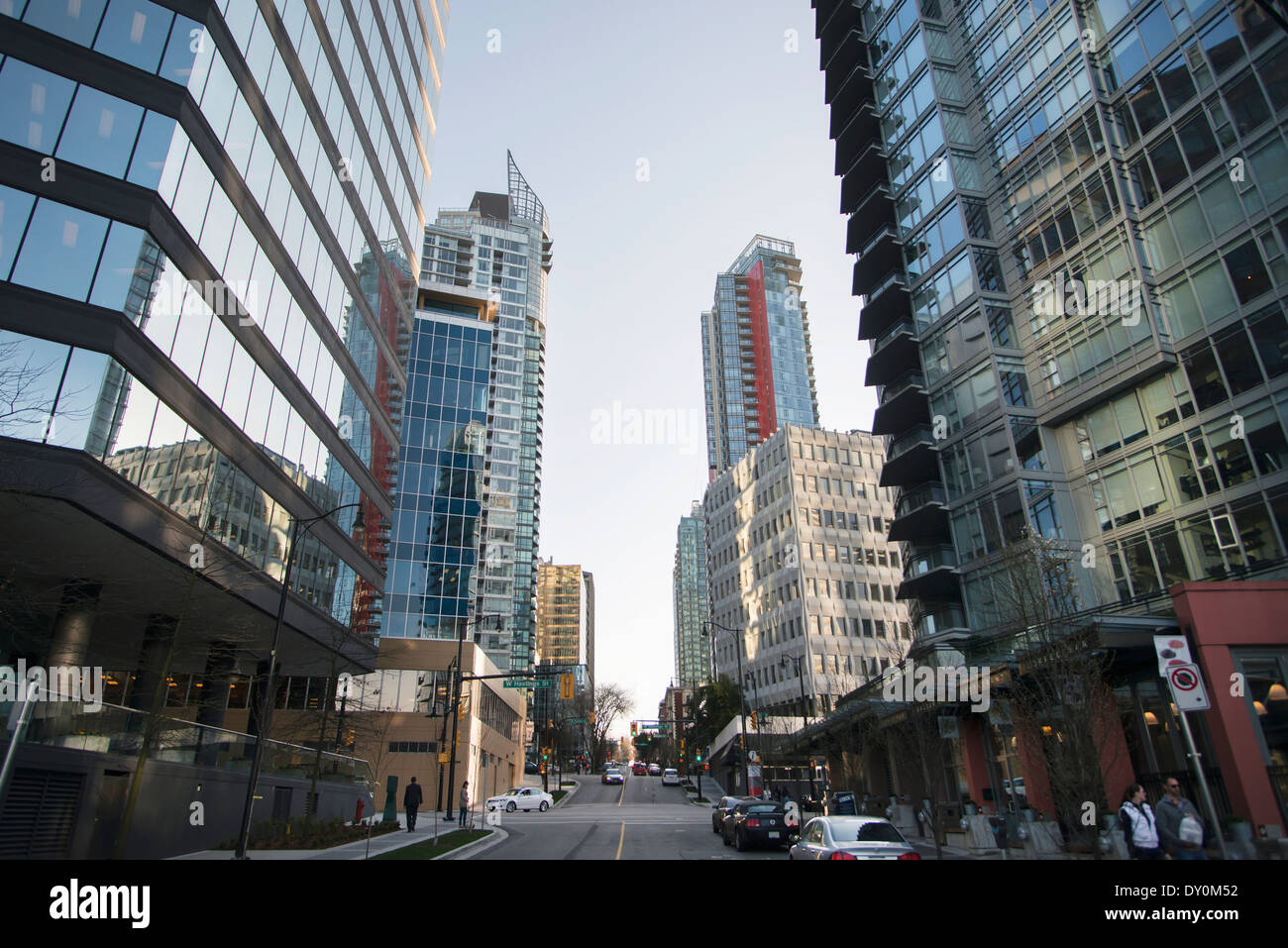 A view down a downtown Vancouver street and residential skyscrapers ...