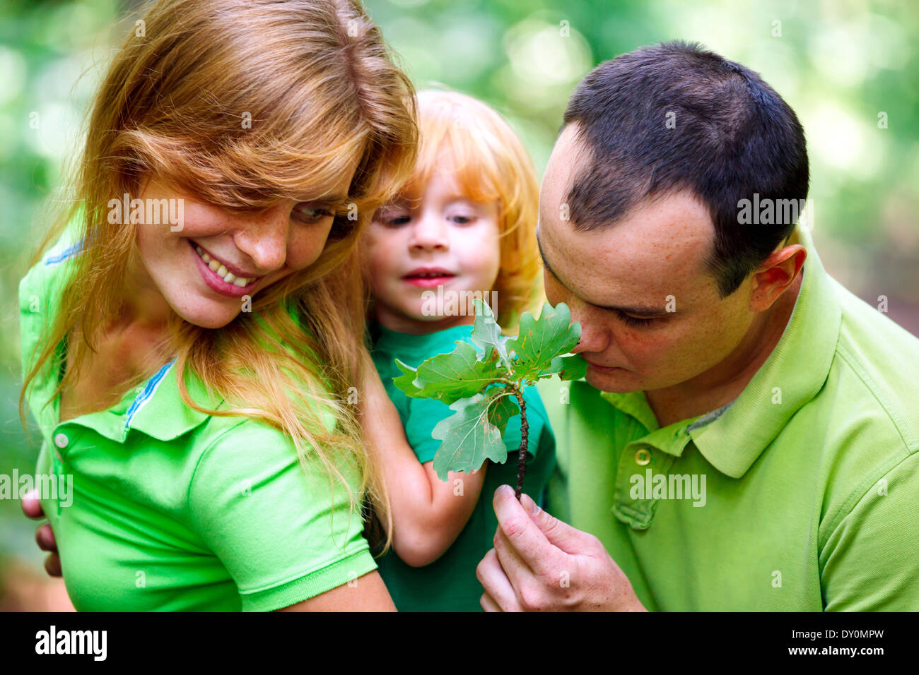 Portrait of Happy Family In Park - outdoor shot Stock Photo - Alamy