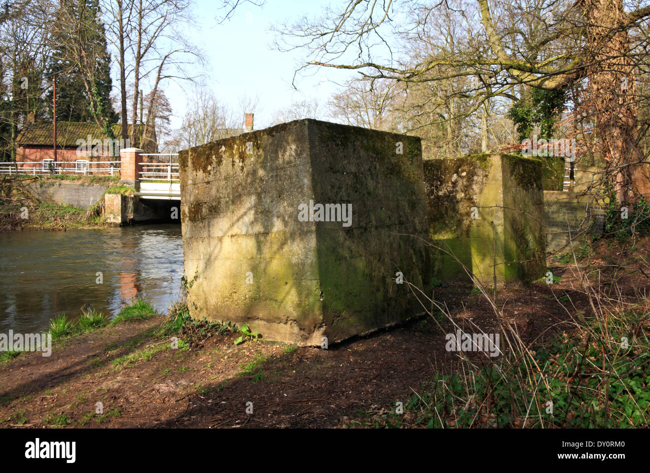 A view of old war defences by the River Wensum and bridge crossing at ...