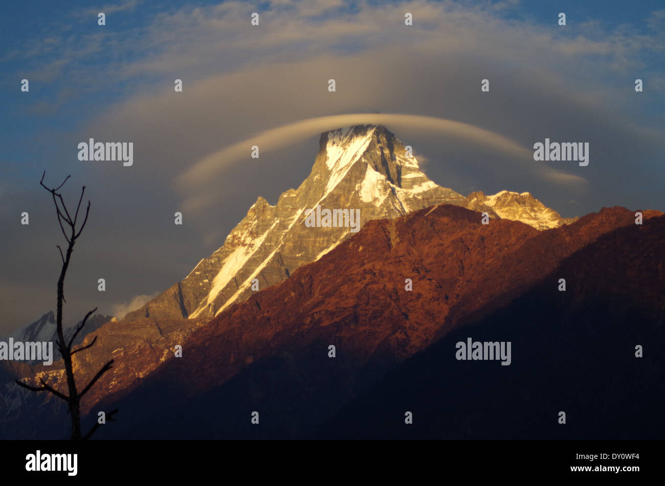 The mount Fishtail, in Nepal, surrounded by a circular cloud during the ...