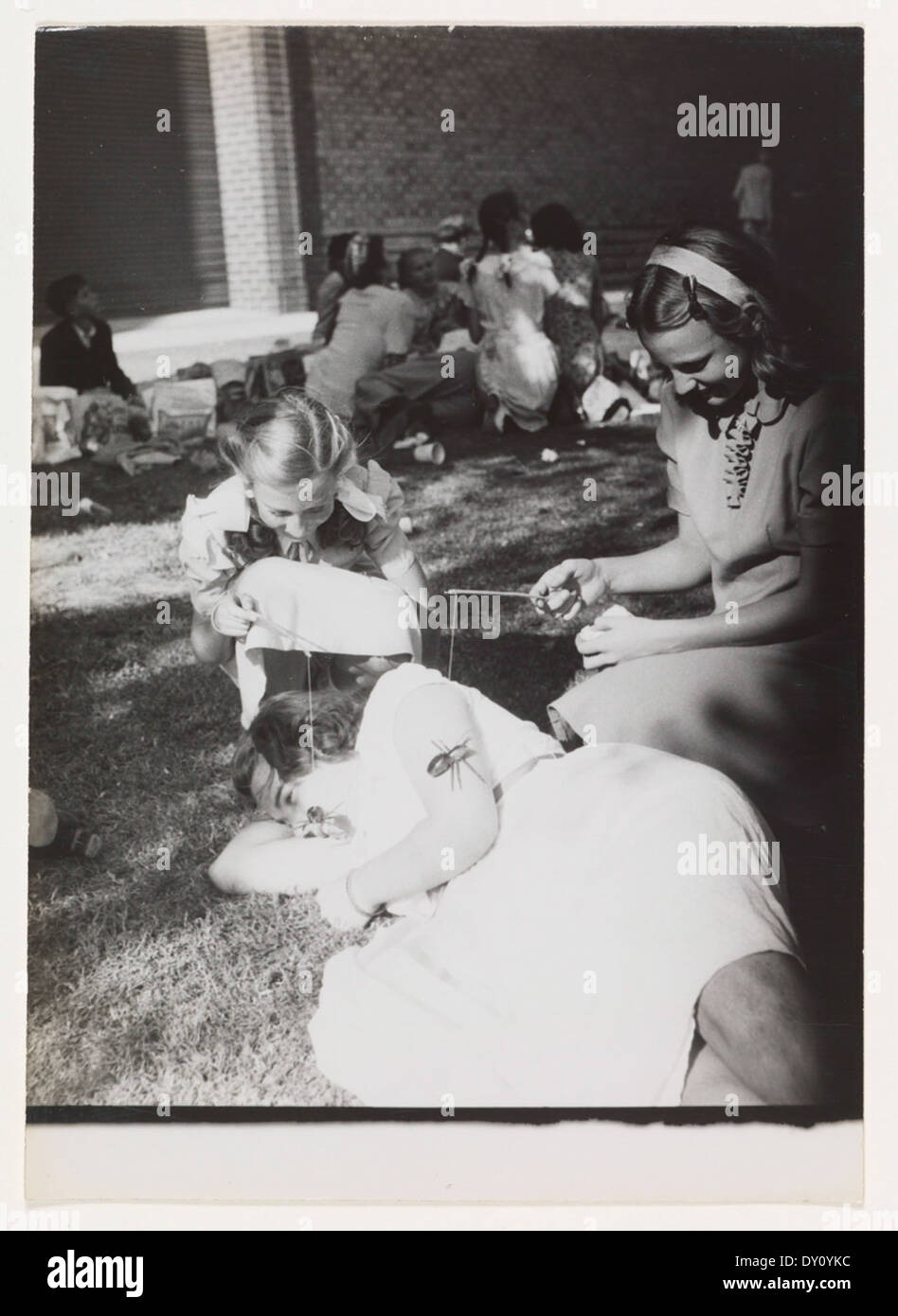 This image from the 1930s by photographer Sam Hood shows a crowd of ...