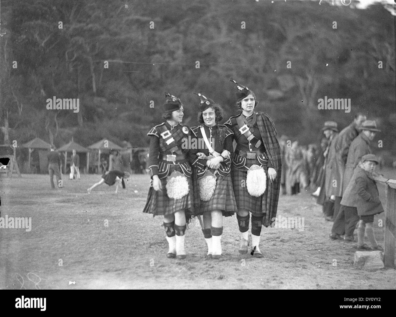 This 1934 photograph shows three women, dressed in traditional Highland ...