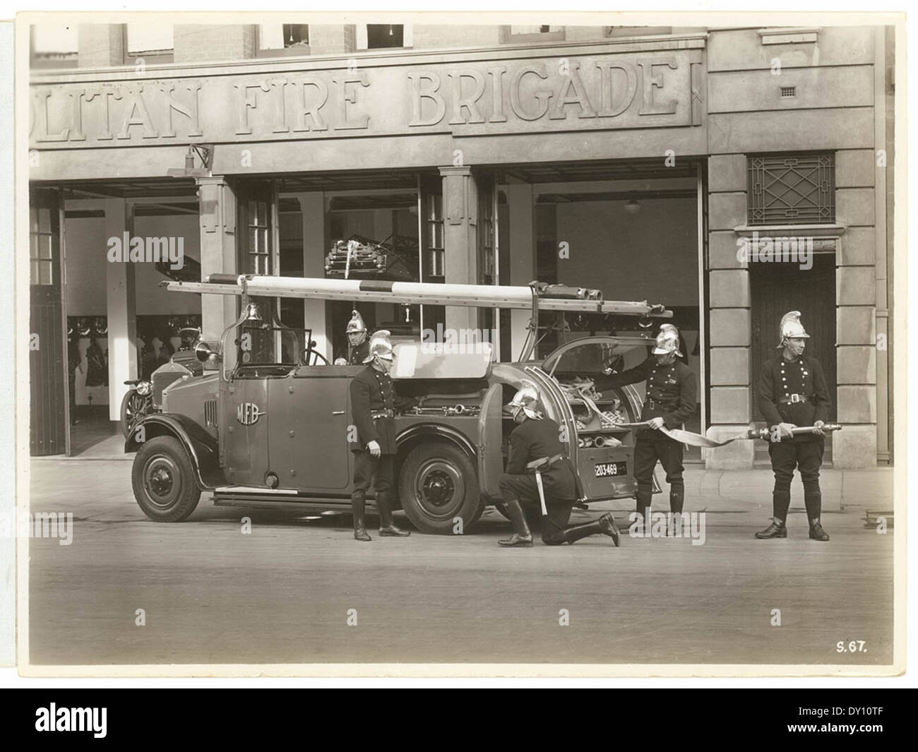 This photograph features five firemen with their Metropolitan Fire ...