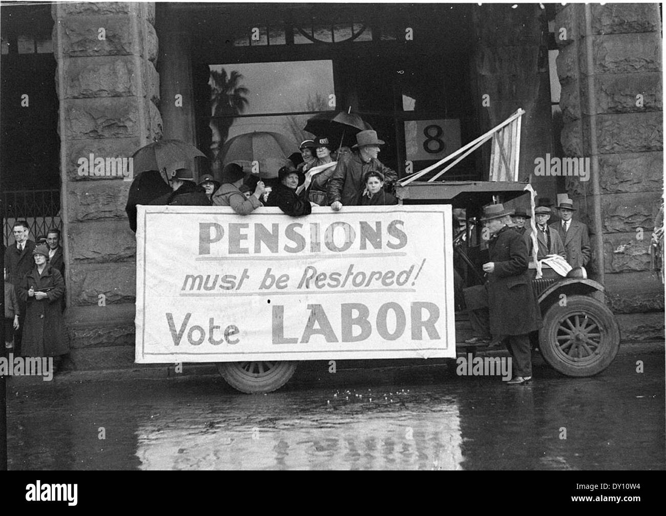 This 1934 political poster, created by Sam Hood, advocates for the ...
