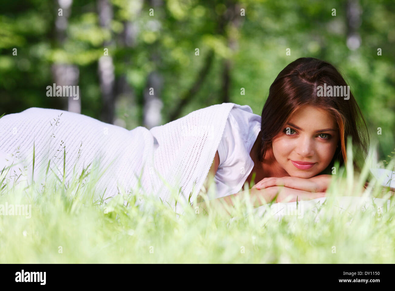 Woman waking in park hi-res stock photography and images - Alamy