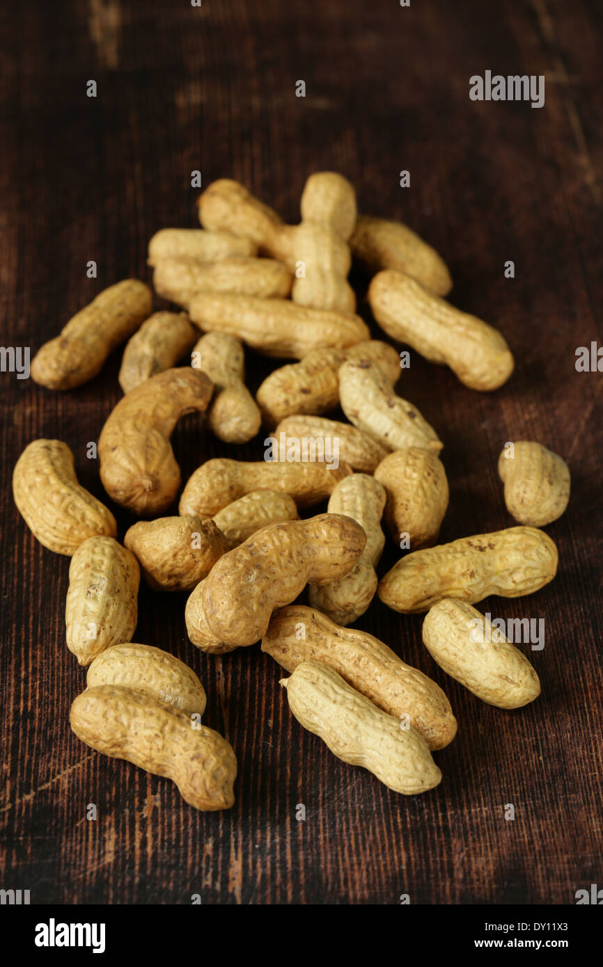 Wooden board with peanuts hi-res stock photography and images - Alamy