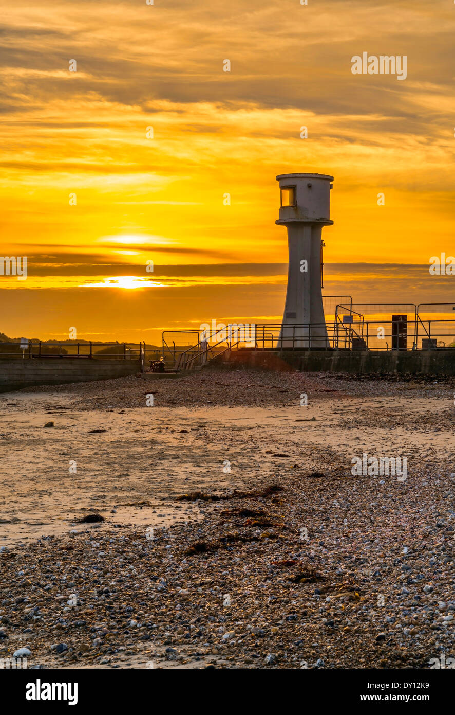 Sunset behind lighthouse at Littlehampton, West Sussex, UK Stock Photo ...