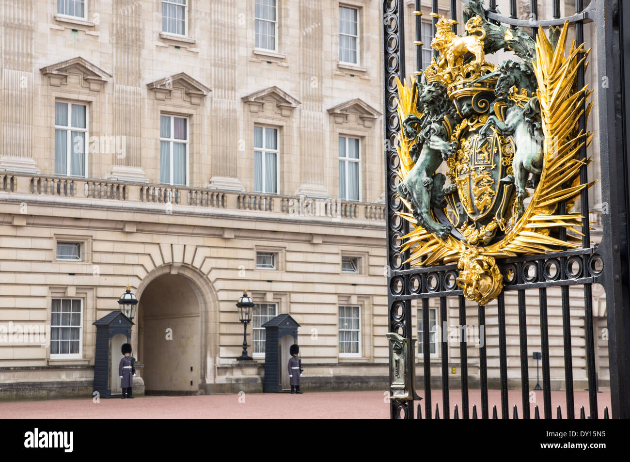 Buckingham Palace gate with Royal Crest, Royal coat of arms of the ...