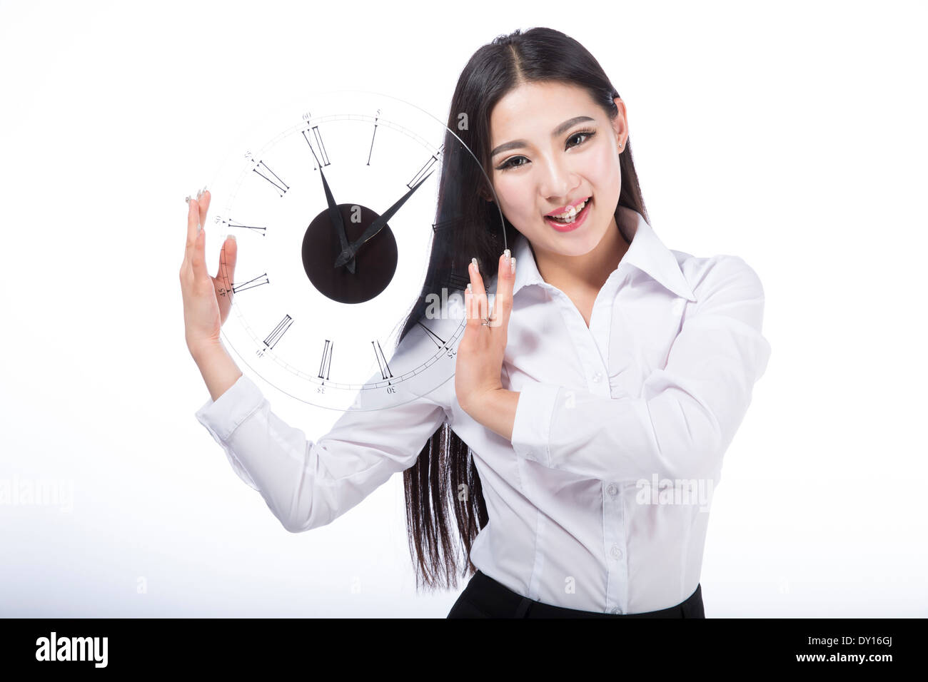 woman holding clock on white background. time management concept Stock ...