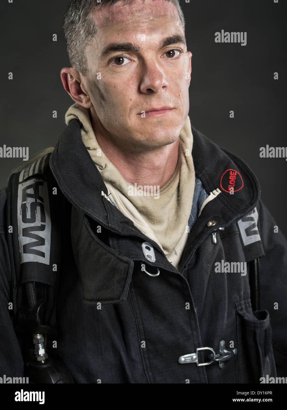 Male firefighter in structural firefighting uniform with breathing ... Male firefighter in structural firefighting uniform with breathing ...