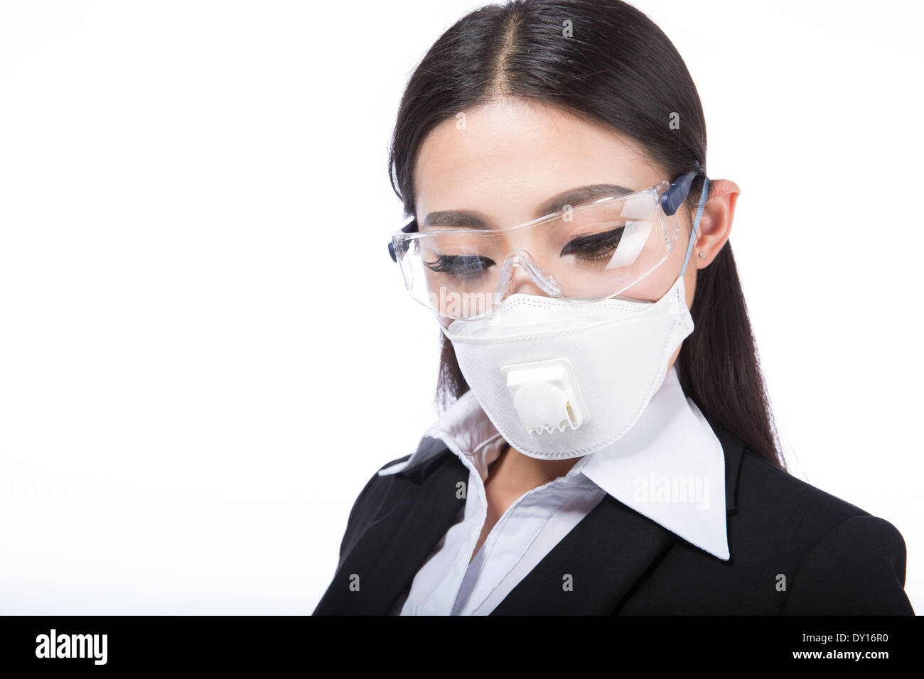 black hair girl with a mask on her face. Isolated on white Stock Photo ...