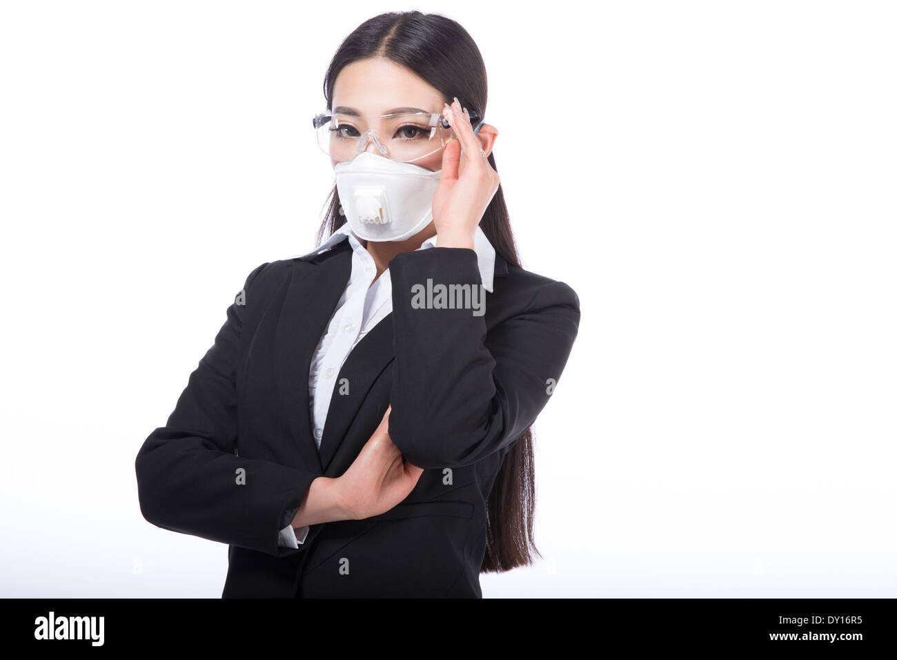 black hair girl with a mask on her face. Isolated on white Stock Photo ...