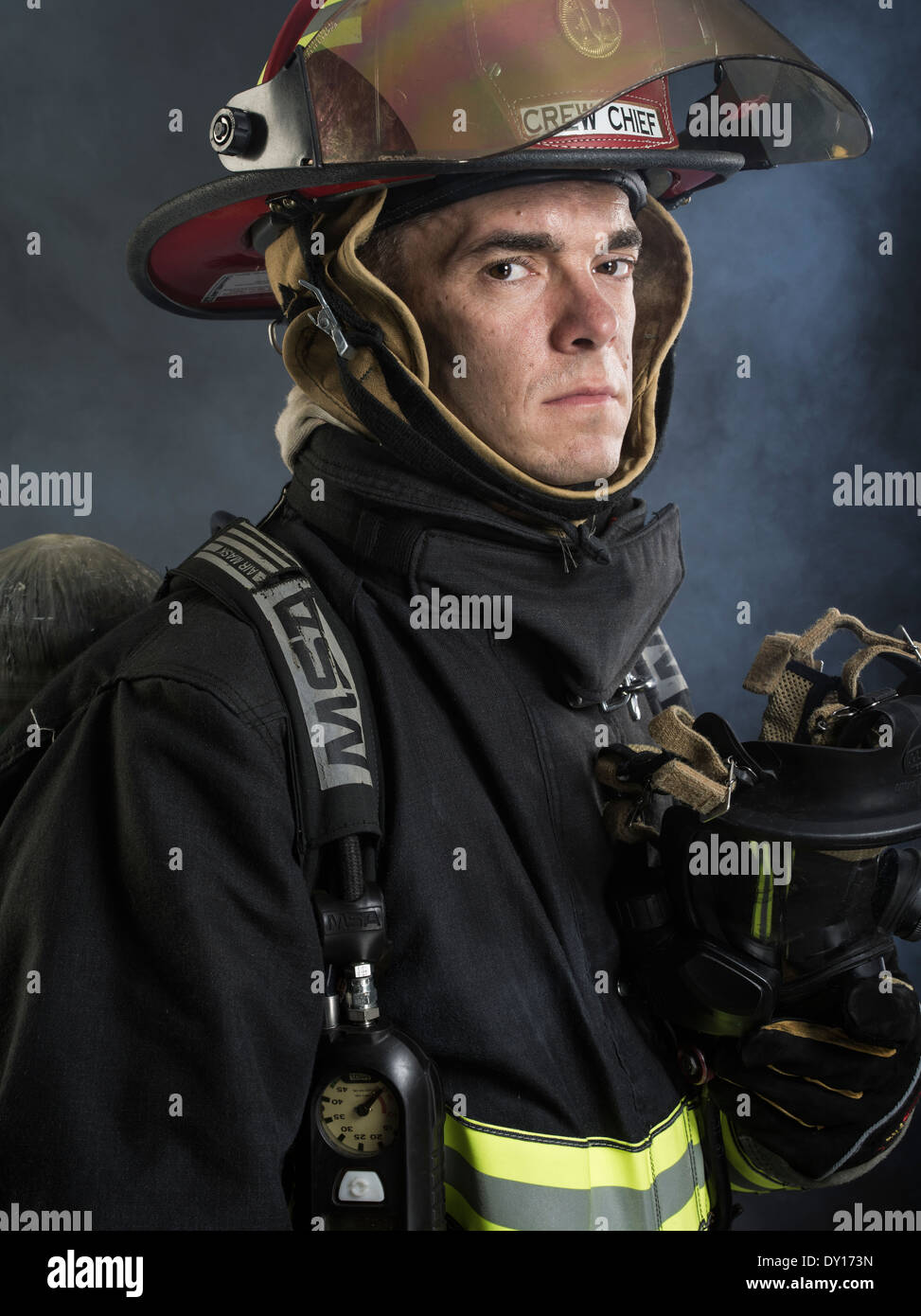 Male firefighter in structural firefighting uniform with breathing ... Male firefighter in structural firefighting uniform with breathing ...
