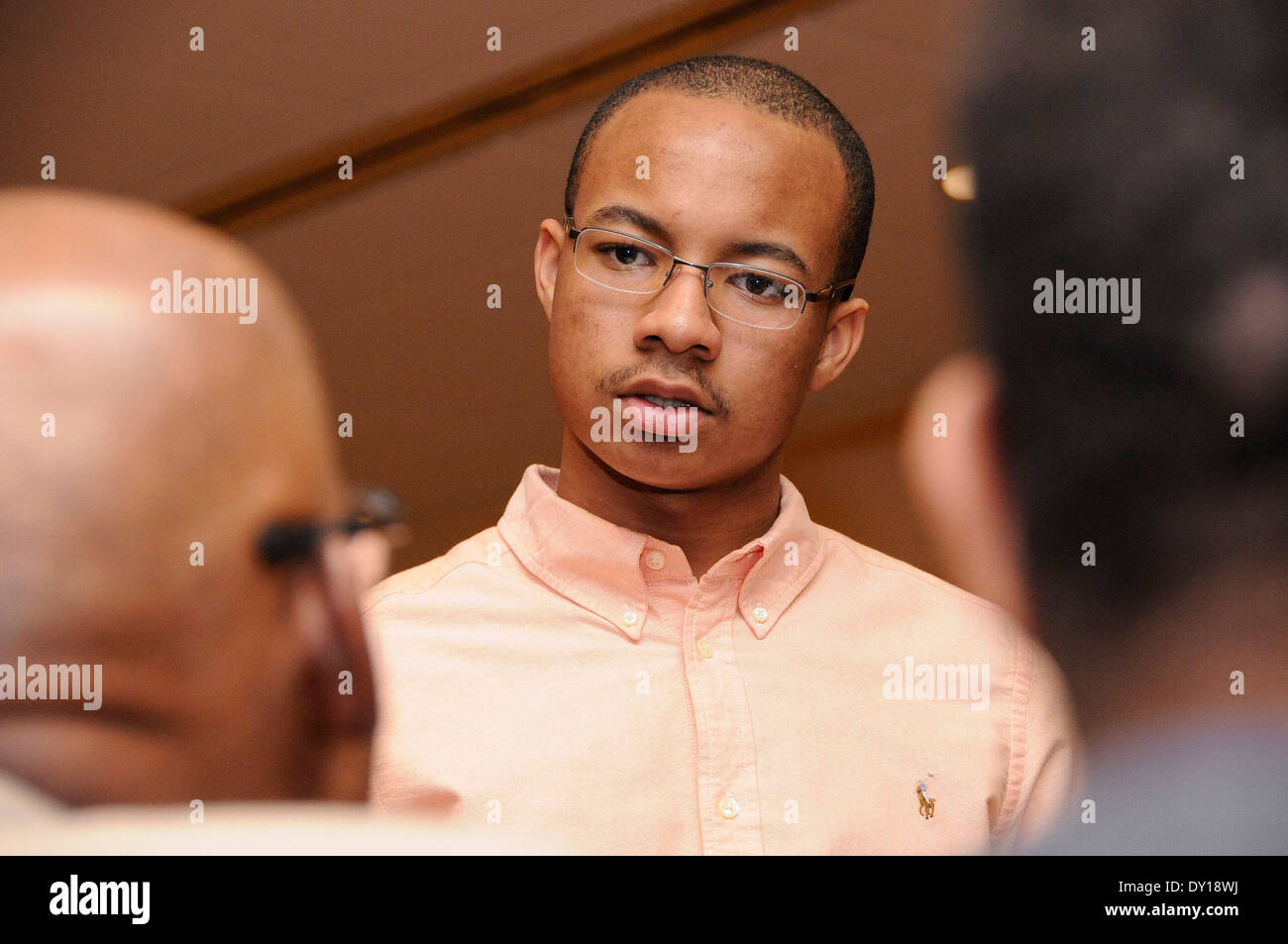 Jaylen Bledsoe, speaks with a conference attendee at the National ...