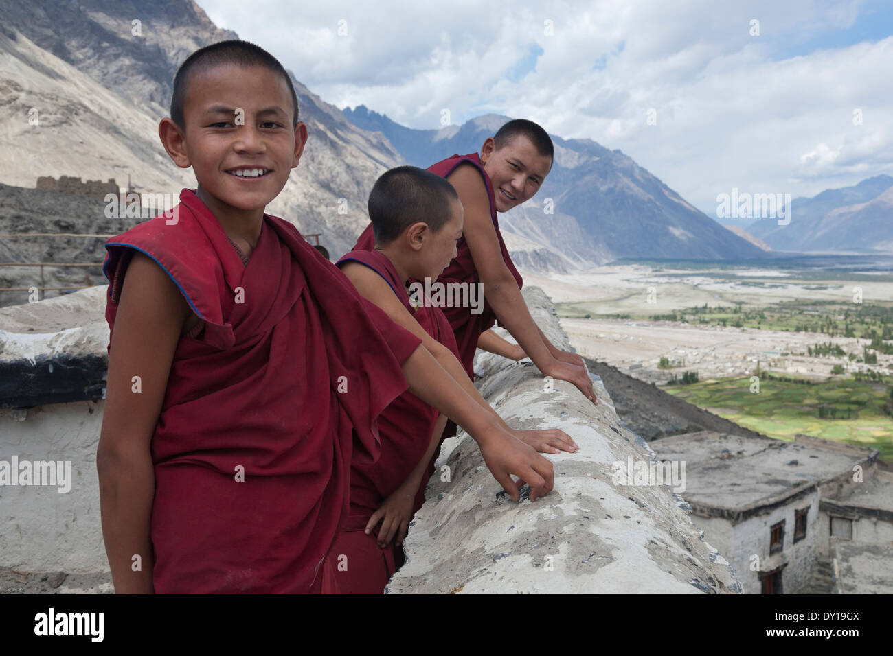 Diskit Village, Ladakh, India. Novoce monks enjoying view from the ...