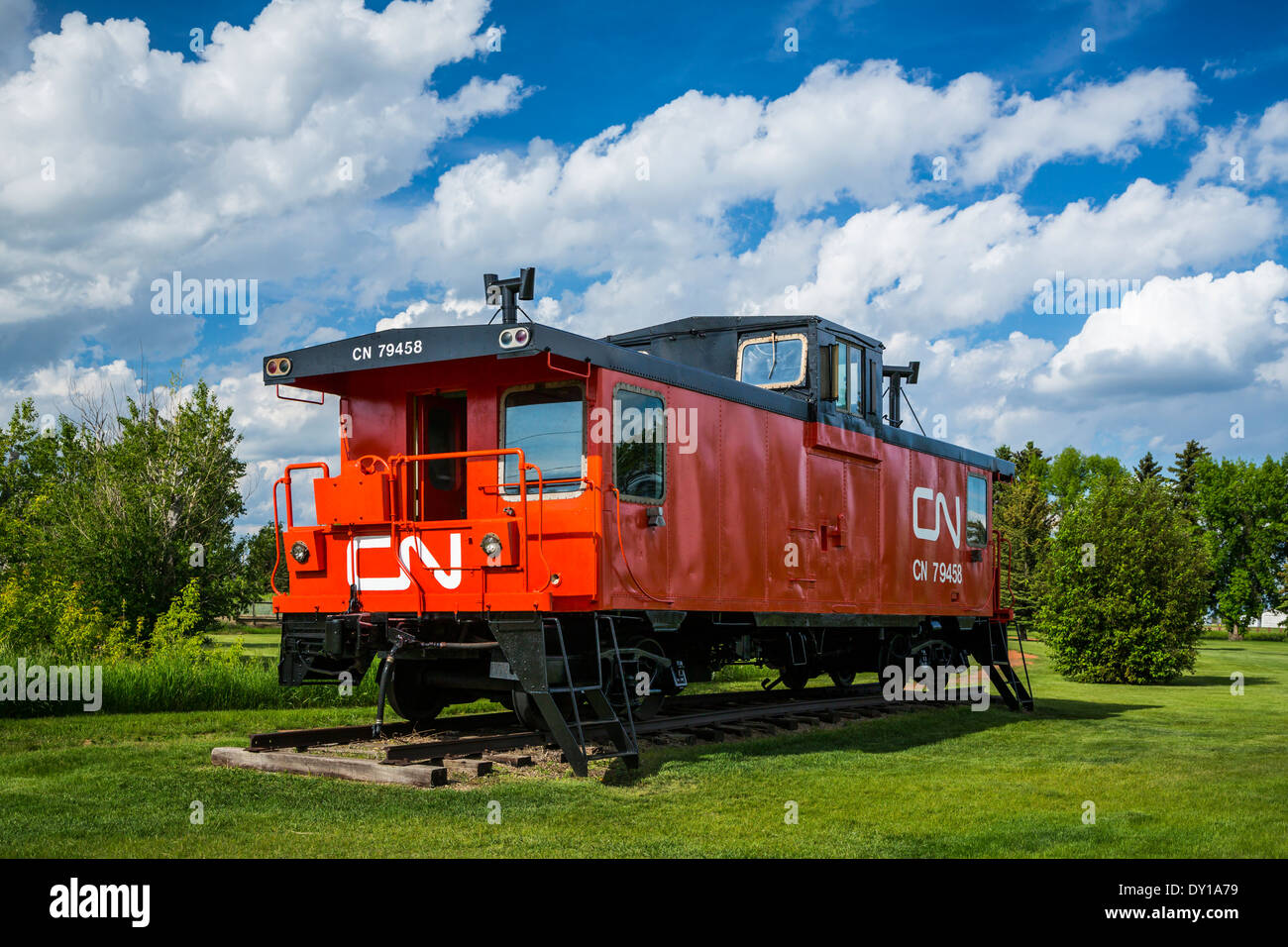 The red CN caboose is a part of history located in a small park in ...