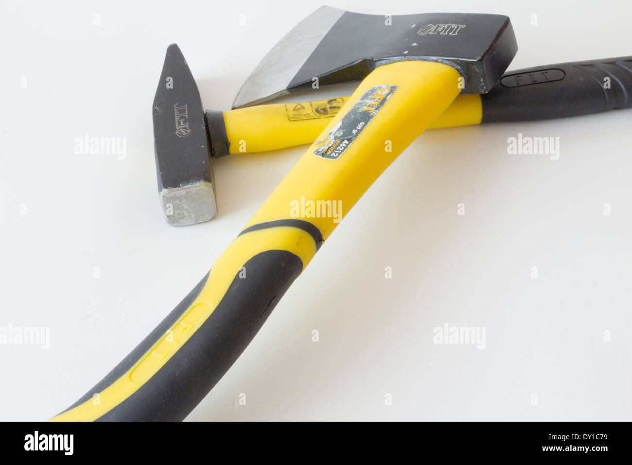 Ax and hammer on white background picture Stock Photo - Alamy