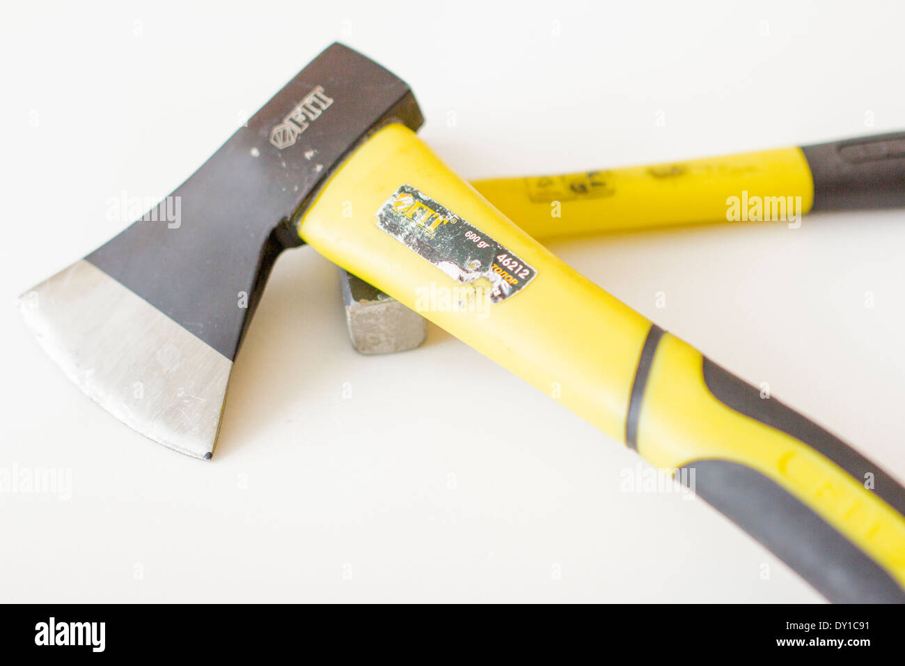 Ax and hammer on white background picture Stock Photo - Alamy