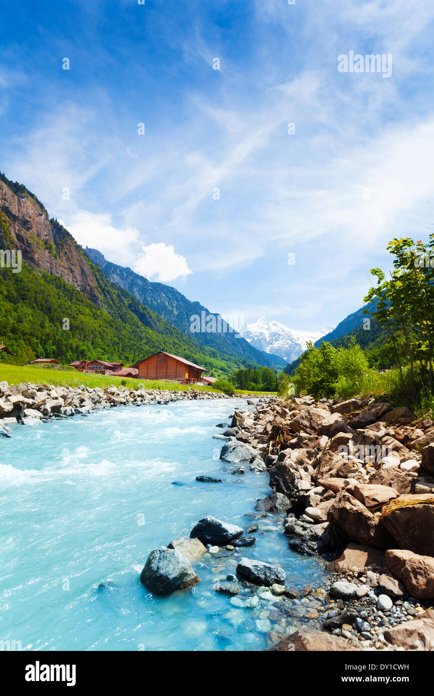 Beautiful Swiss landscape with river stream Stock Photo - Alamy
