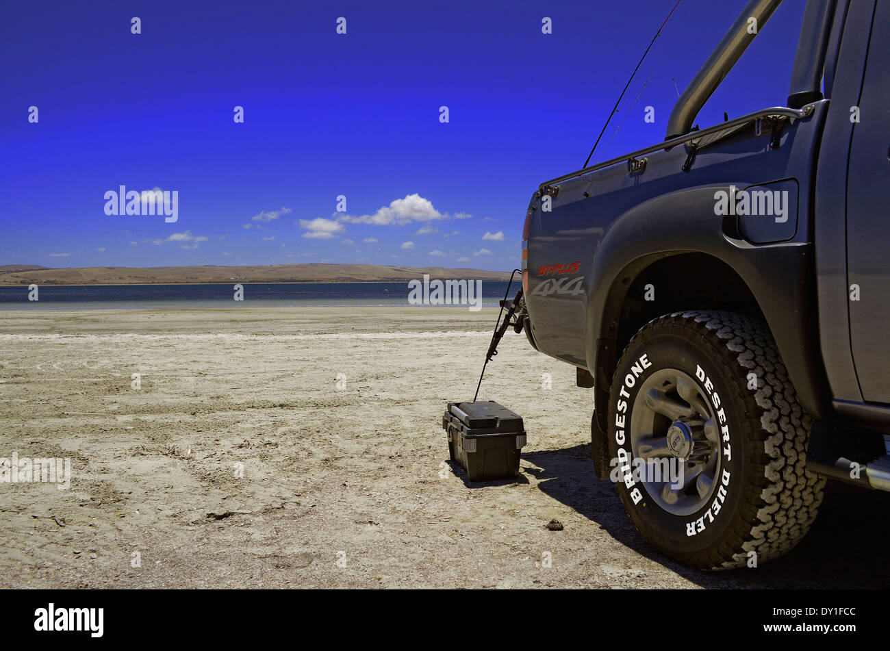 4WD parked on beach with fishing gear Stock Photo - Alamy