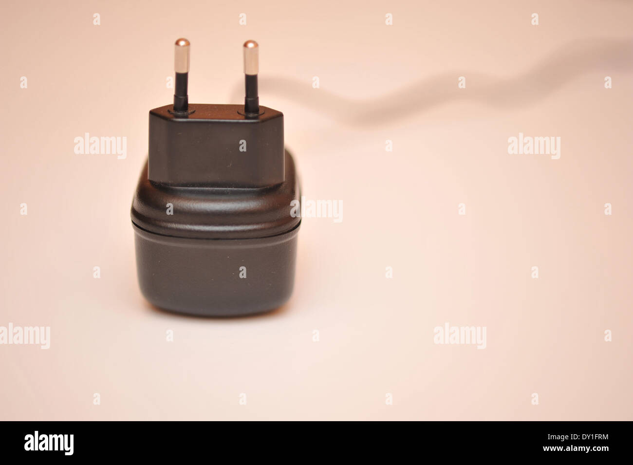 Power plug on light background Stock Photo - Alamy