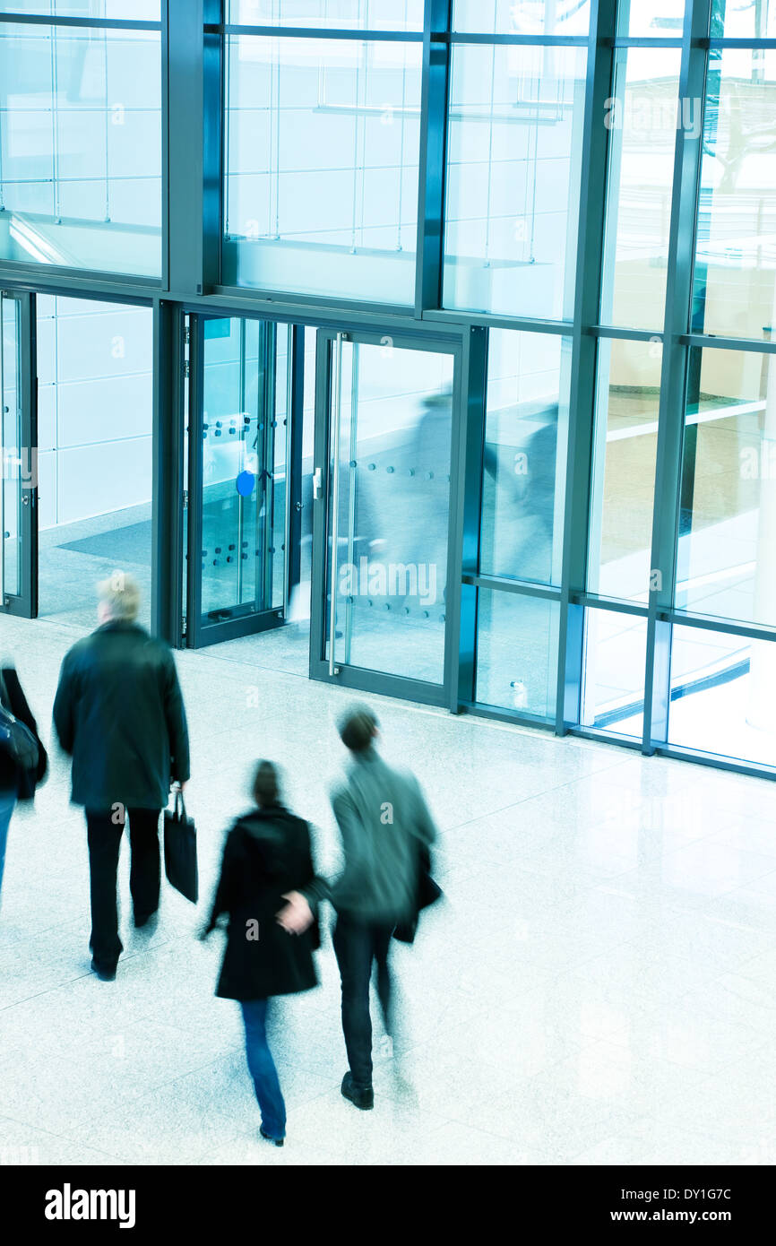 people rushing through corridor Stock Photo - Alamy
