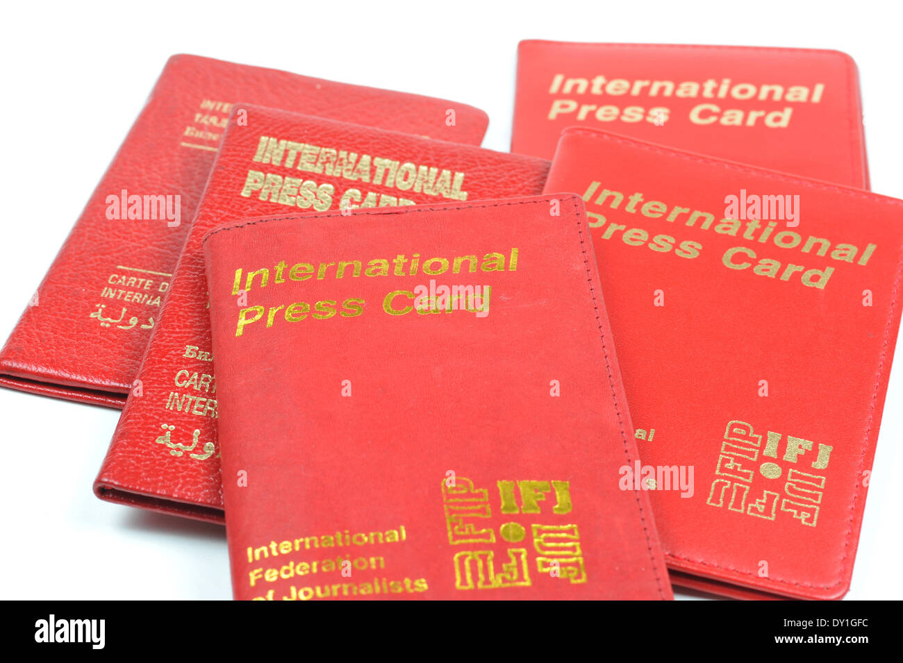 Several press credentials with light background. Those credentials are ...