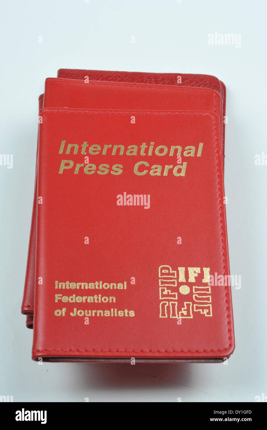 Several press credentials with light background. Those credentials are ...