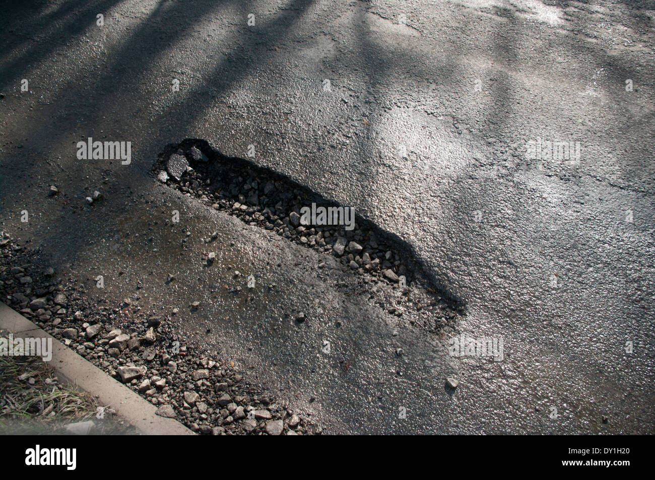 Pothole in a Road Stock Photo - Alamy