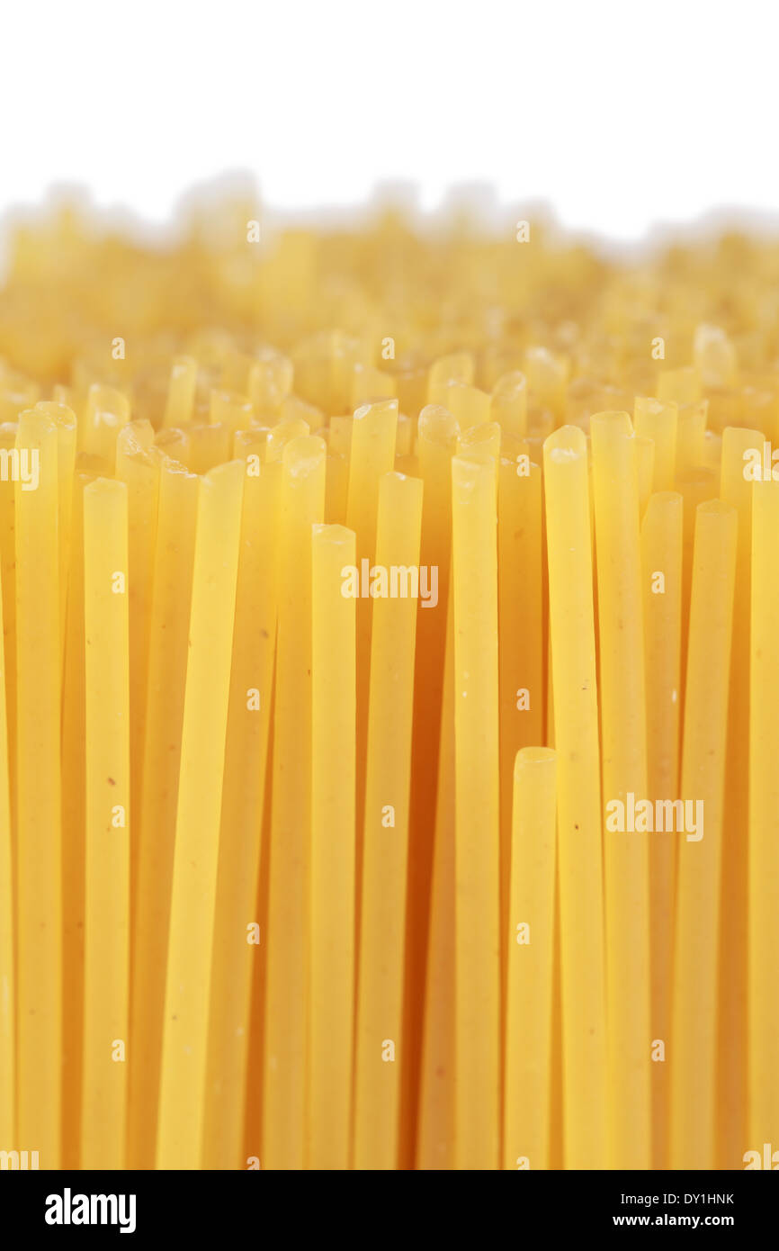 Spaghetti forming a background with copy space Stock Photo - Alamy