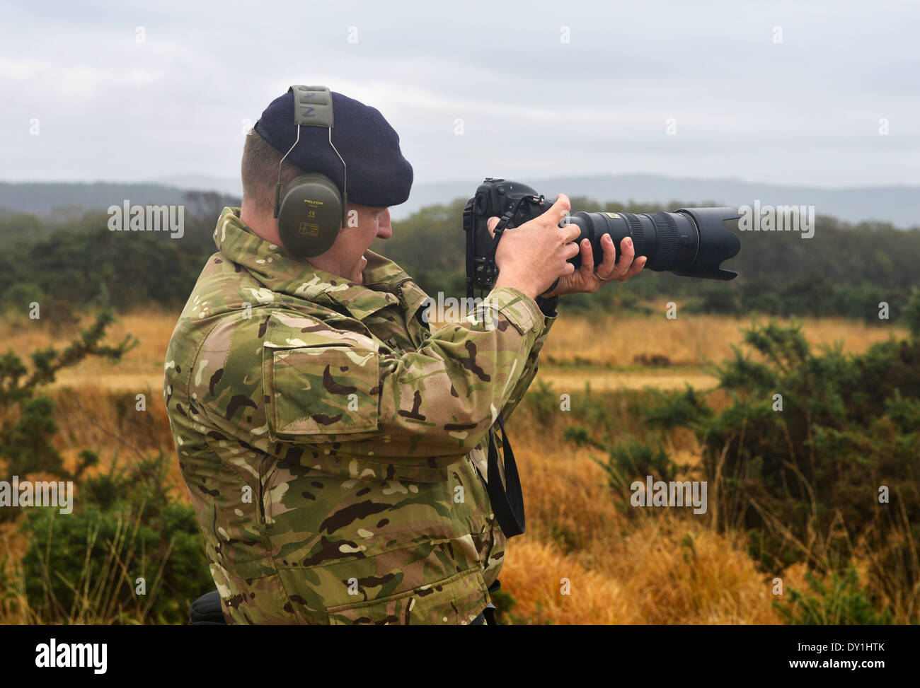 Soldier filming video with a DSLR camera, UK Stock Photo - Alamy
