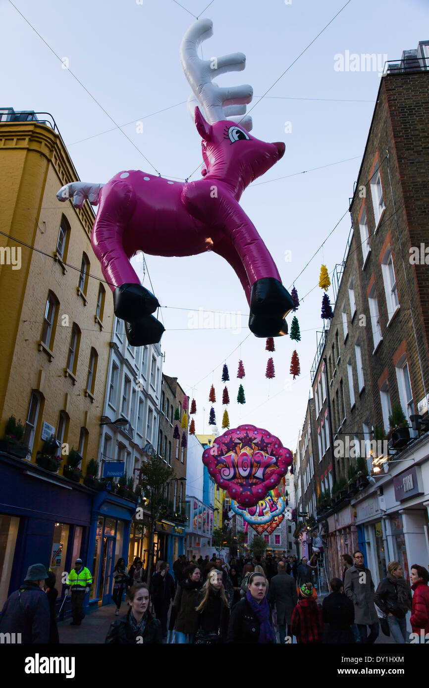 A giant inflatable pink reindeer balloon forms part of the Christmas ...