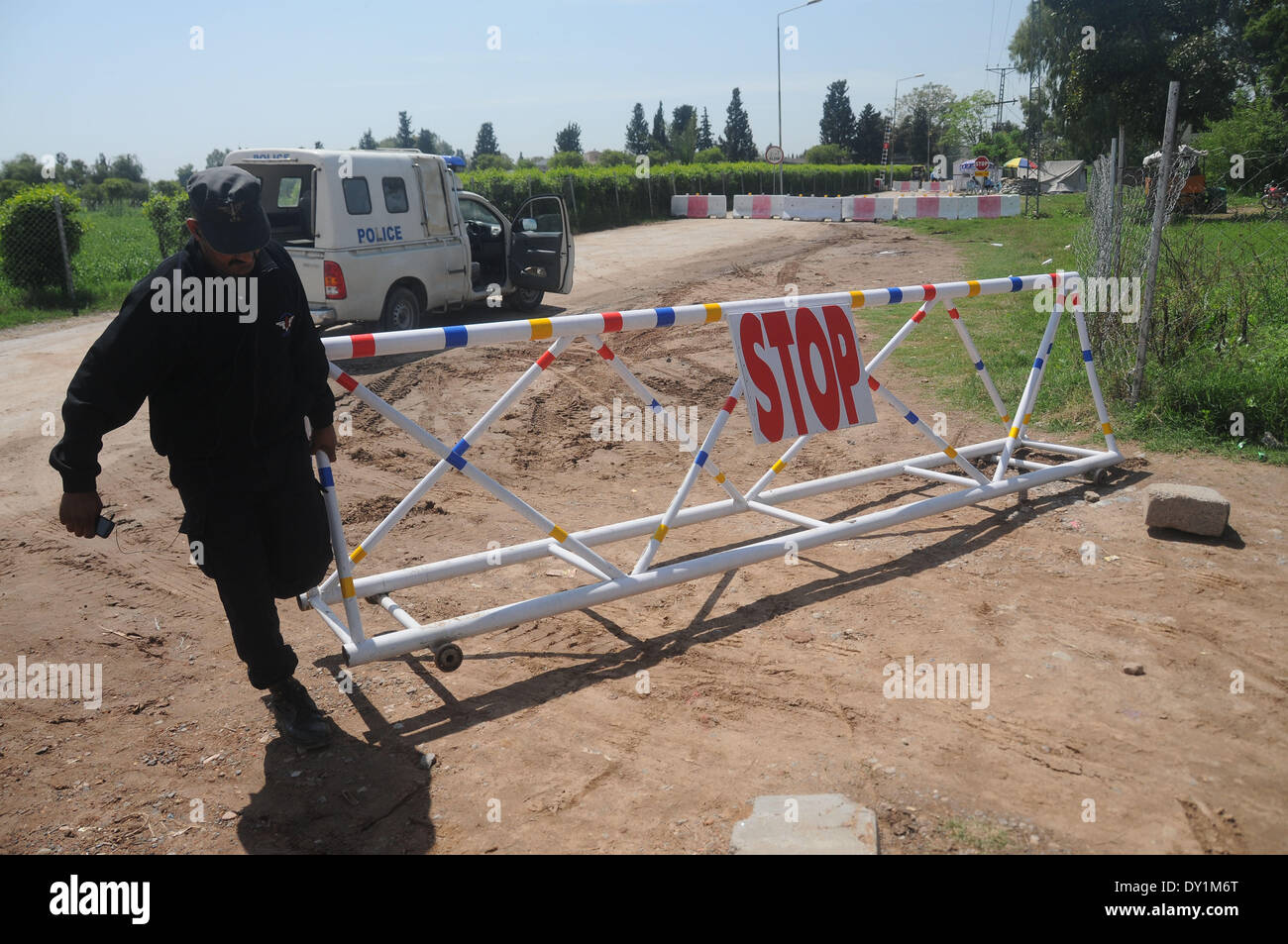 Islamabad, Pakistan. 3rd April 2014. A Pakistan police officer stands ...