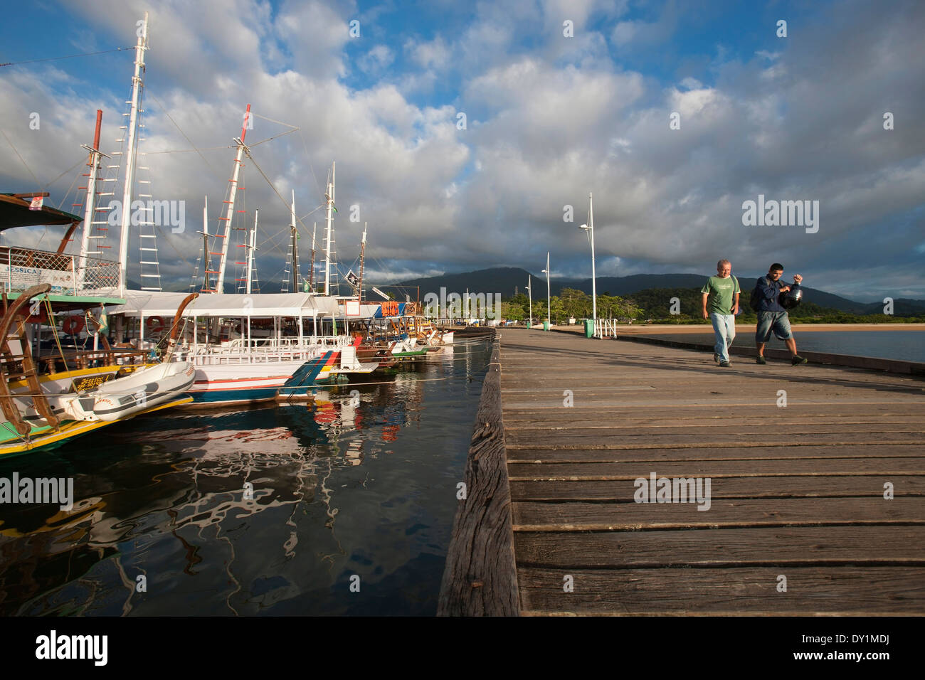 Paraty, colonial town, fishing boats, port, harbour, men on pier, Costa ...