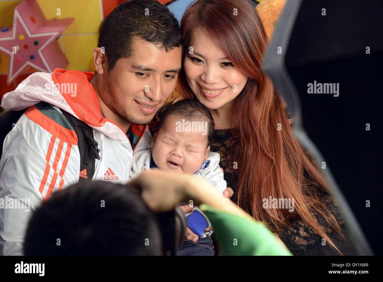 Taipei. . 3rd Apr, 2014. Local residents pose for group pictures at ...