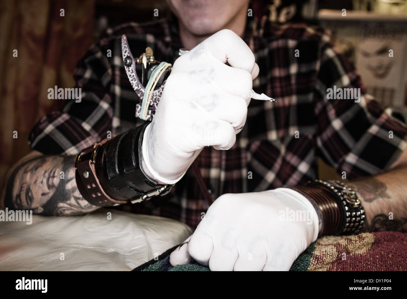 Studio showing process of making a tattoo Stock Photo - Alamy