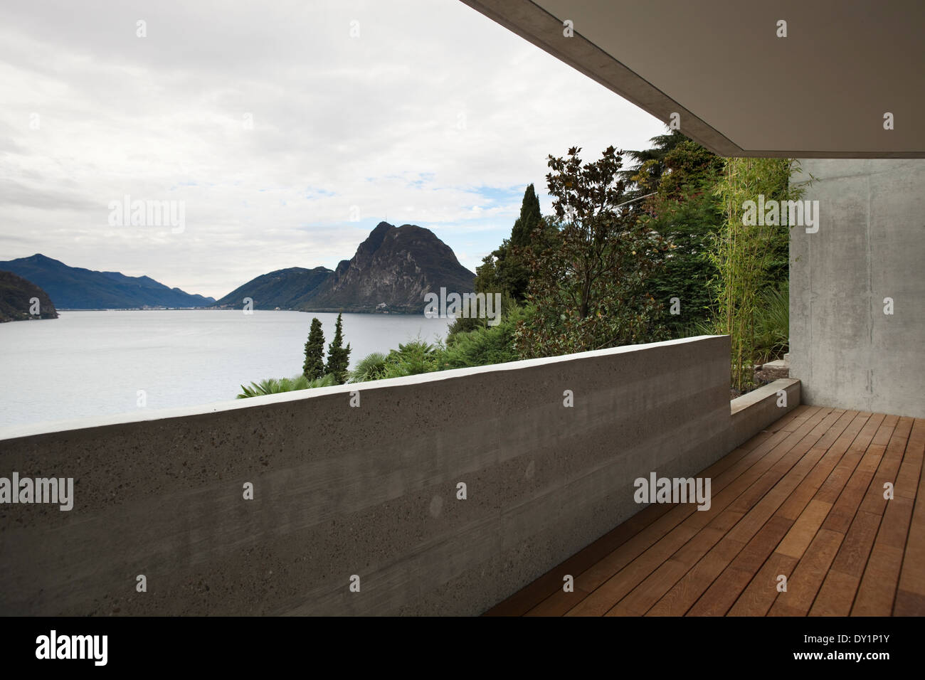Modern house, balcony overlooking the lake Stock Photo - Alamy