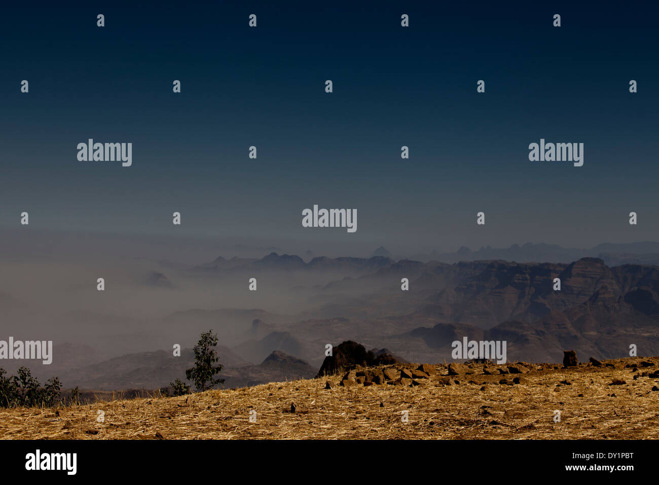 African mountain vista Misty Blue Sky Stock Photo - Alamy