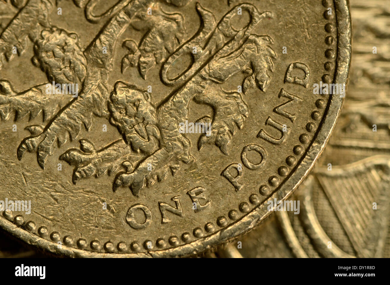 Concept Pound Sterling / Euro Dollar Exchange. Detail of old style 'One ...