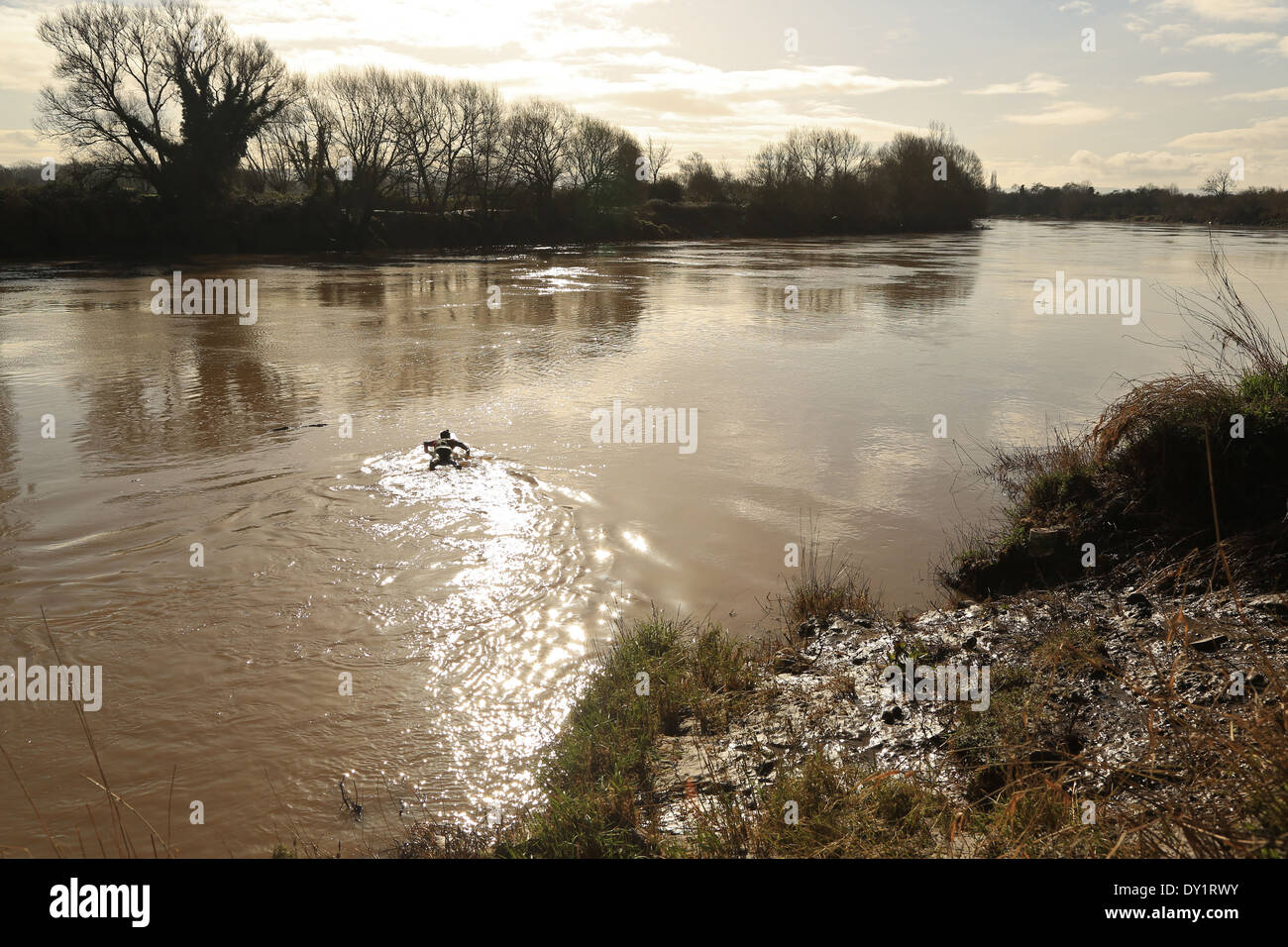 Tidal bore river surfers hi-res stock photography and images - Alamy