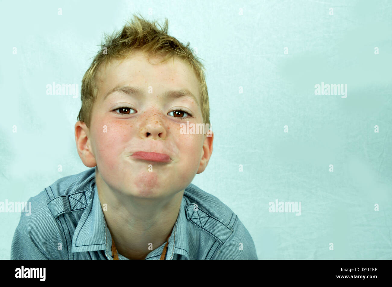 Boy pulling face hi-res stock photography and images - Alamy