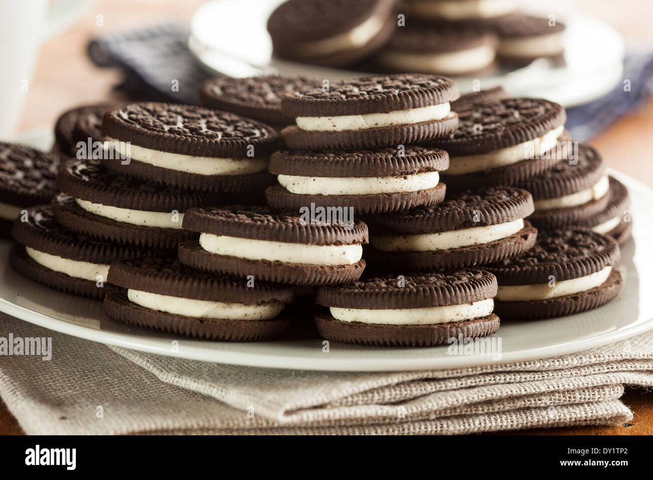 Unhealthy Chocolate Cookies with Vanilla Cream Filling Stock Photo - Alamy