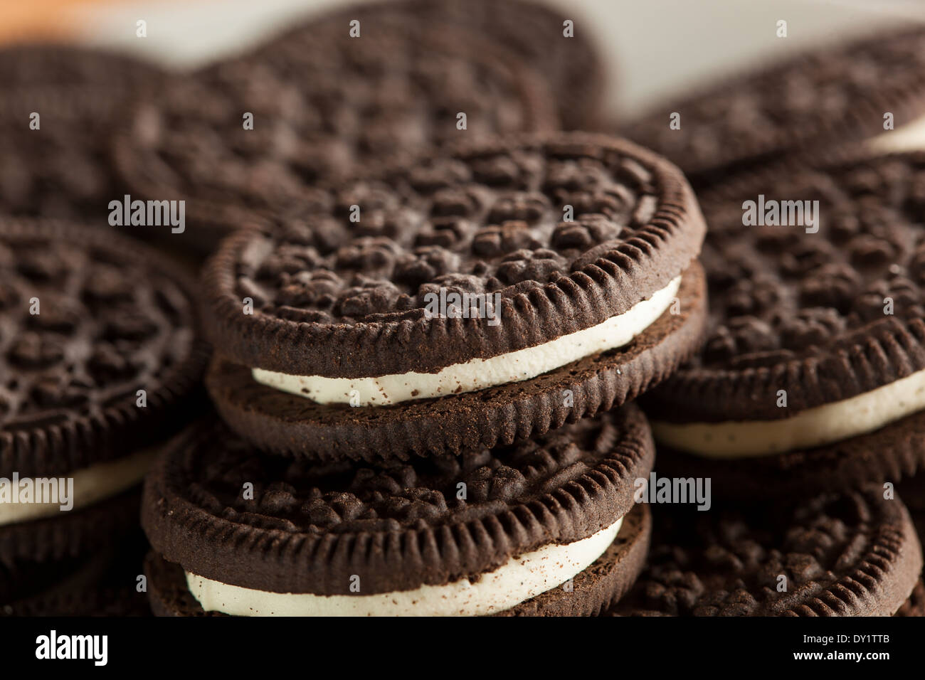 Unhealthy Chocolate Cookies with Vanilla Cream Filling Stock Photo - Alamy
