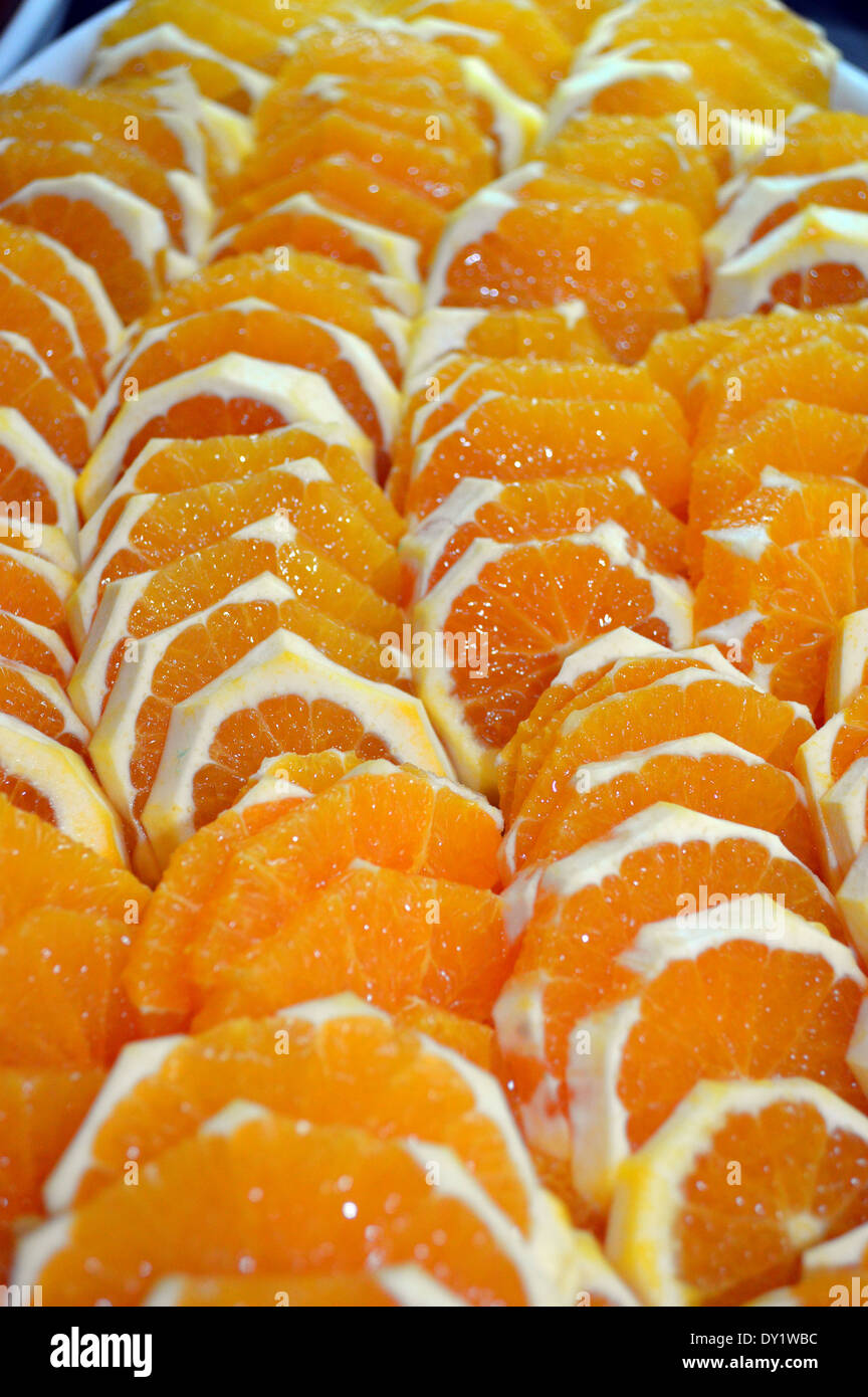 Sliced and Peeled Oranges on Display on a Plate on a Hotel Buffet Table ...