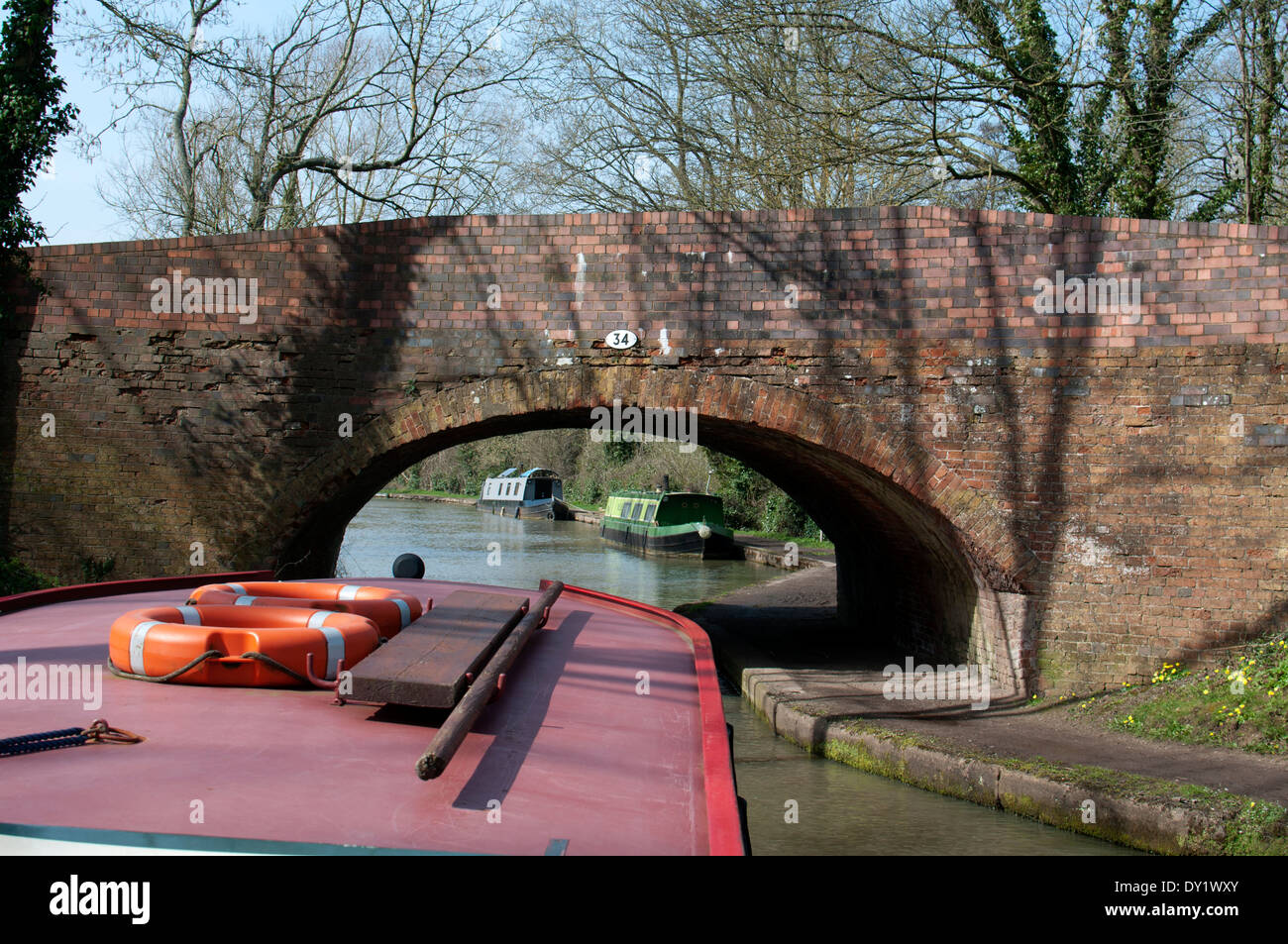 Narrowboat approaching bridge hi-res stock photography and images - Alamy
