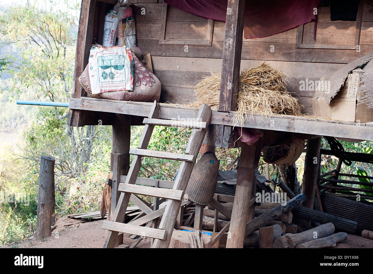 open wooden storehouse with steps up to storage space in Huay Pakoot ...