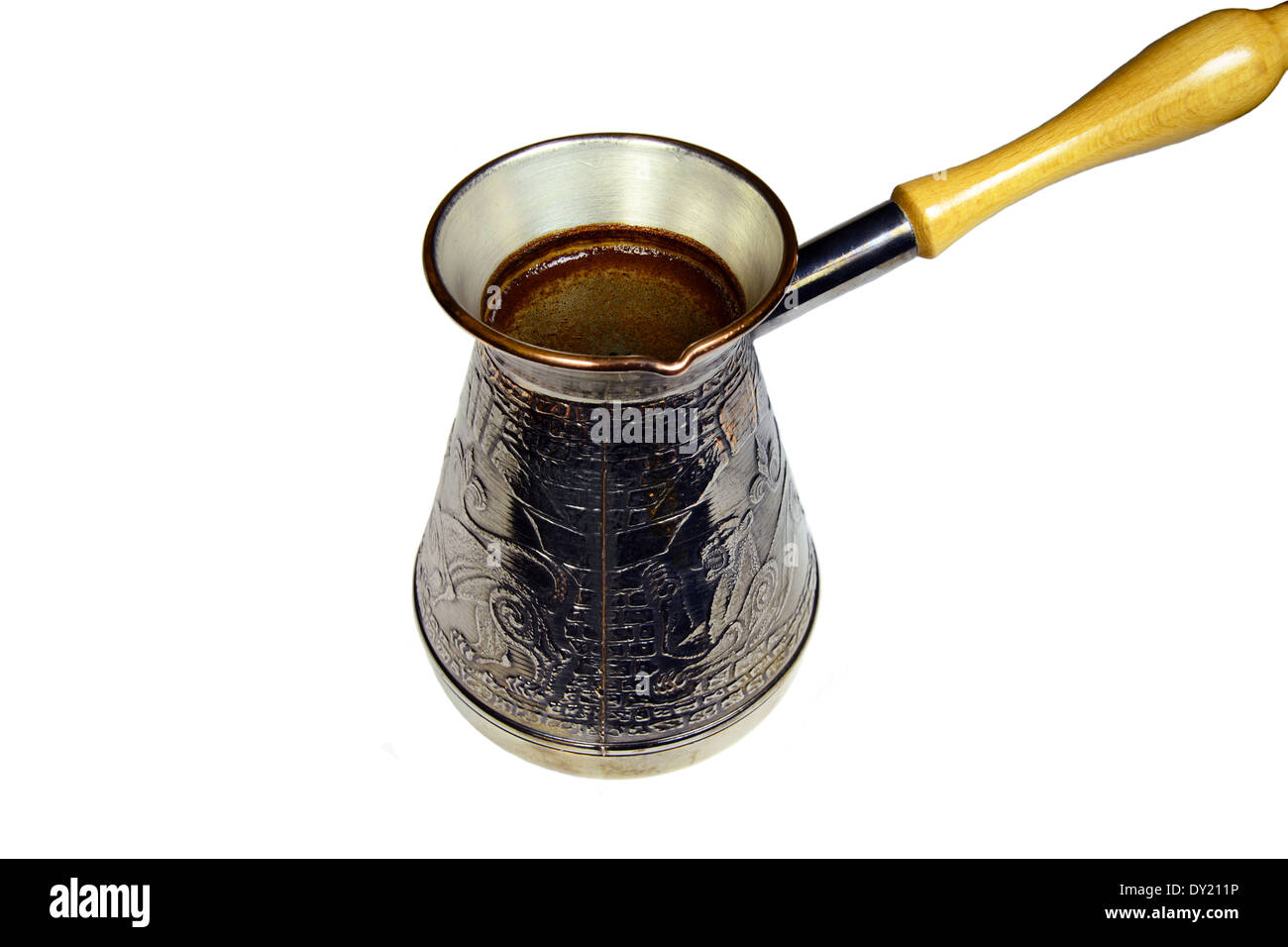 turkish coffee brewing pot isolated on white background Stock Photo - Alamy