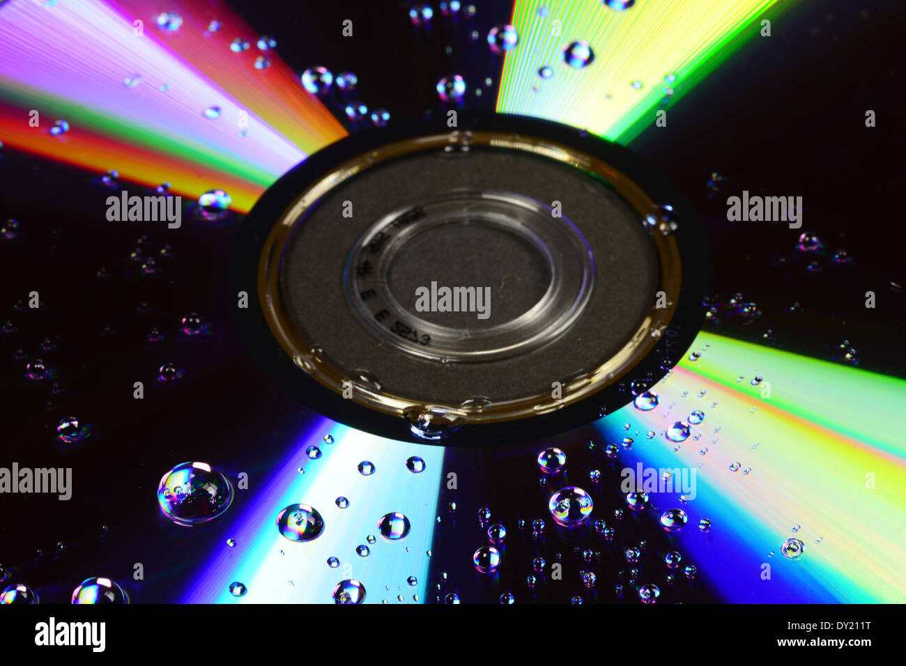compact disc with water drops isolated on black background Stock Photo ...