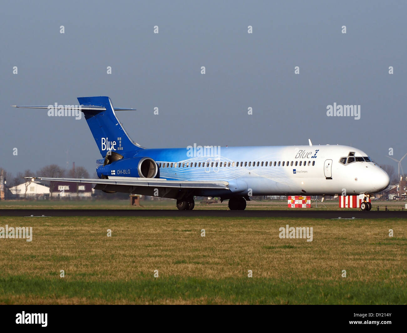OH-BLG is a Boeing 717-2CM operated by Blue1, seen landing at Schiphol ...